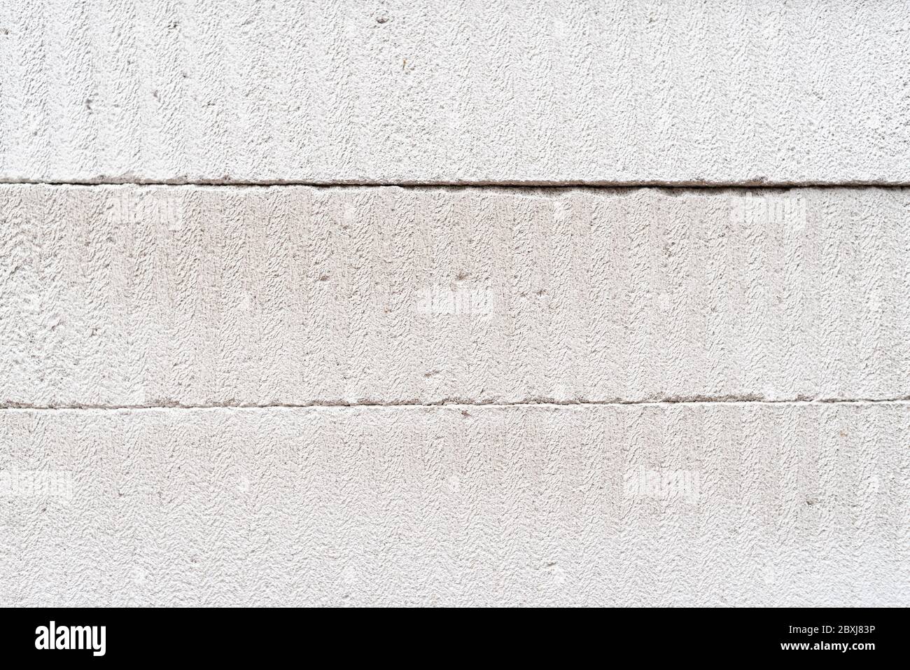 The modern white concrete tile wall background and texture copy space ...