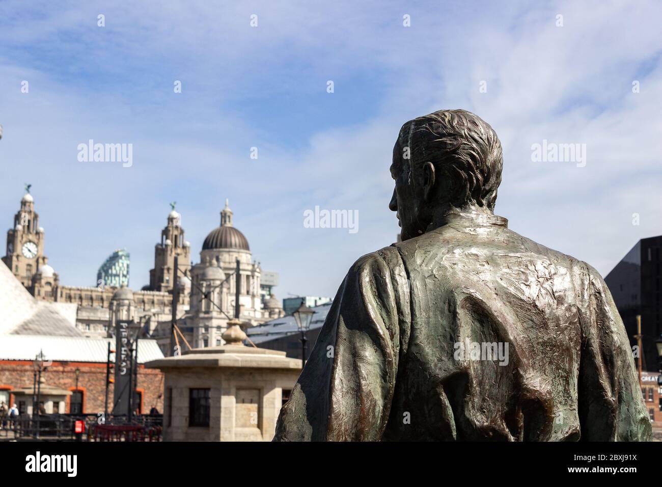 Detail of The Emigrants statue by Mark de Graffenried with historic ...