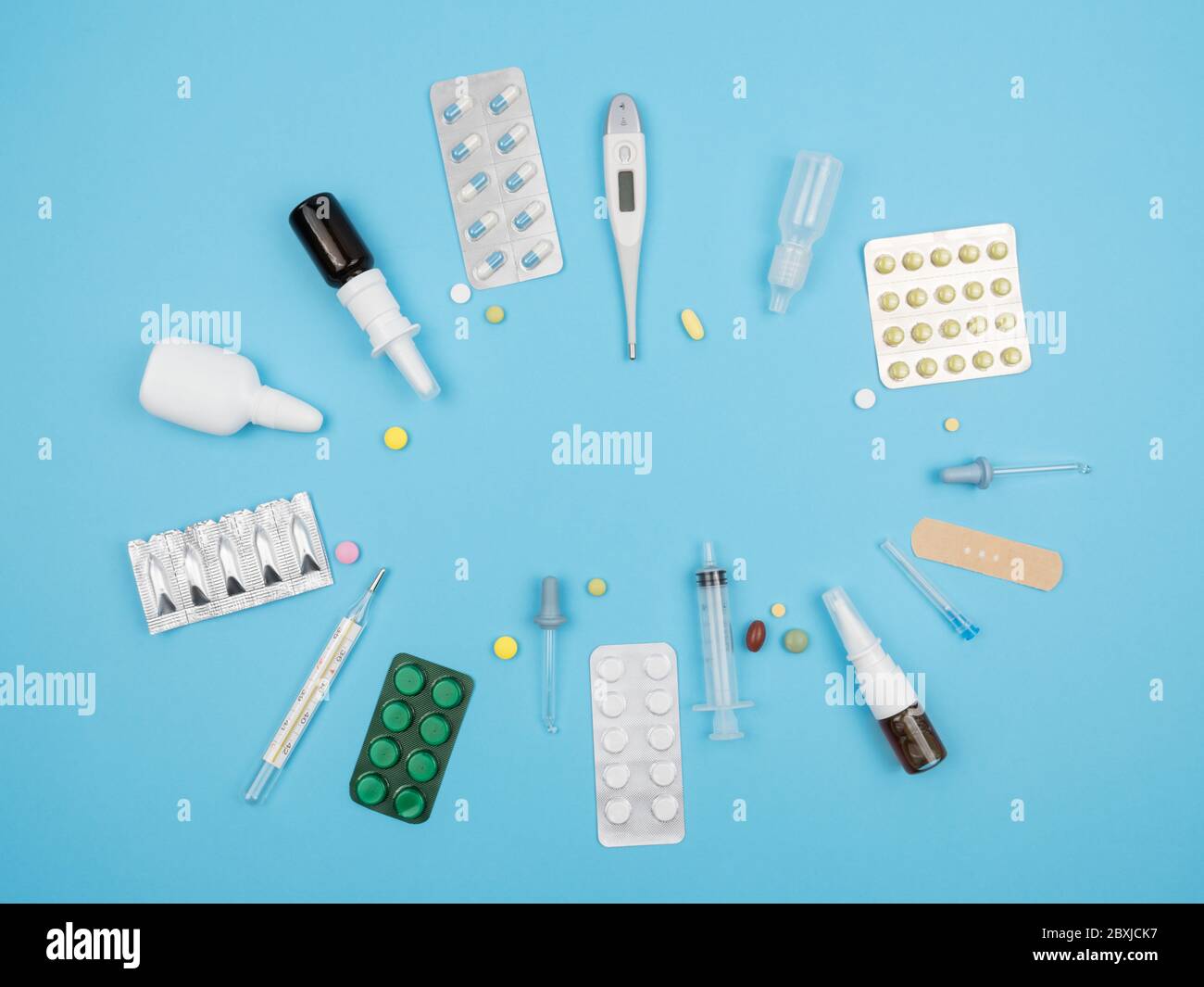 Medical items for the treatment of diseases on a blue background Stock ...