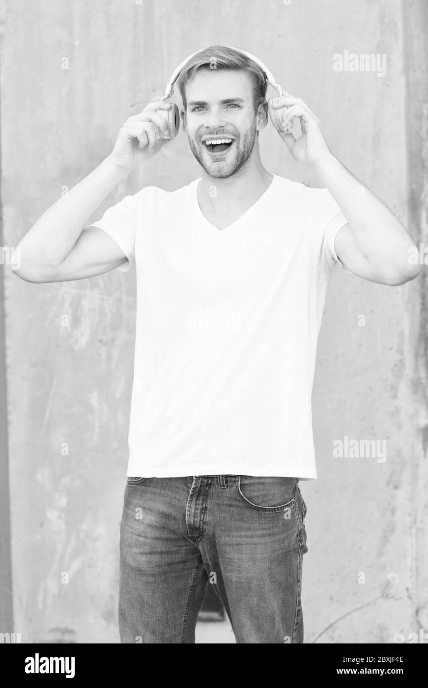 Cheerful man in musical headphones Black and White Stock Photos ...