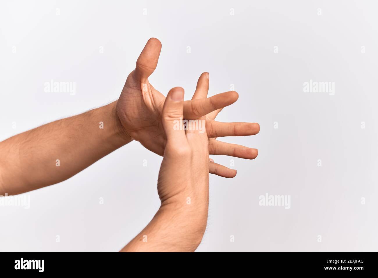 Hand of caucasian young man showing fingers over isolated white ...