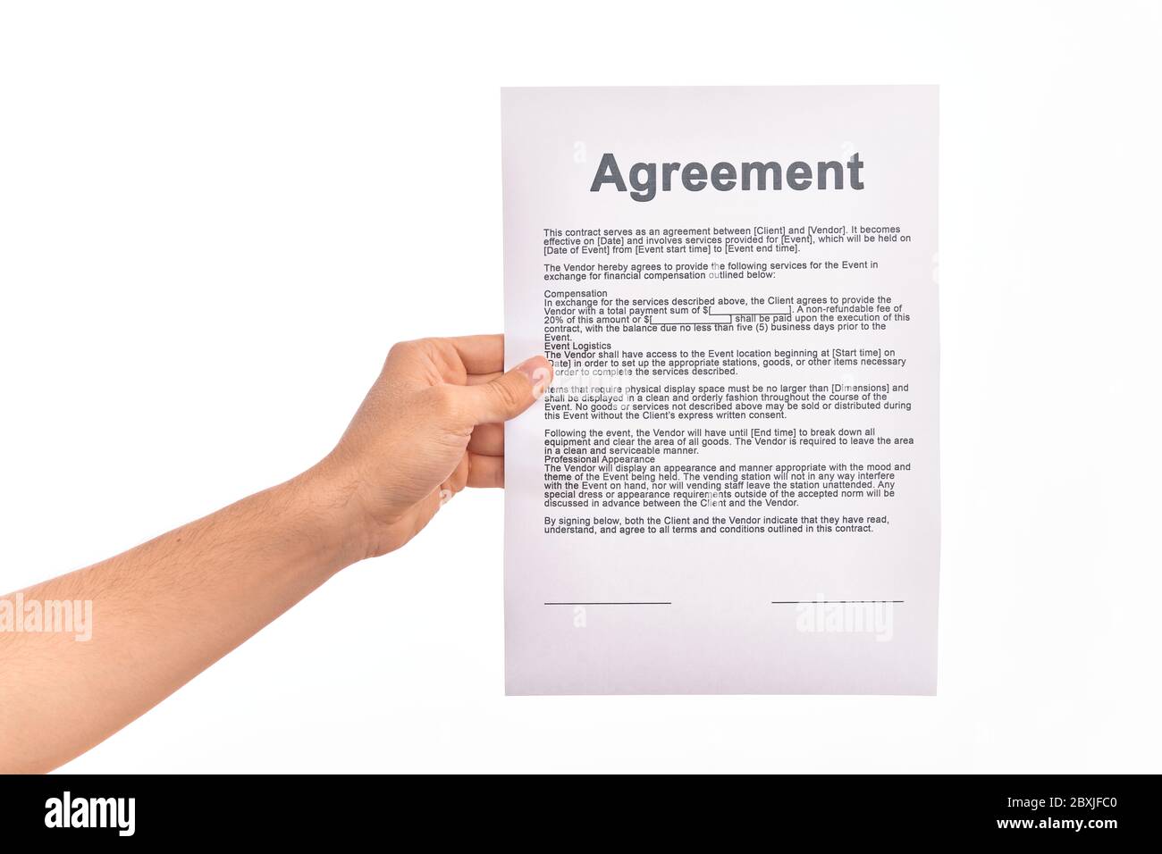 Holding agreement paper over isolated white background Stock Photo - Alamy