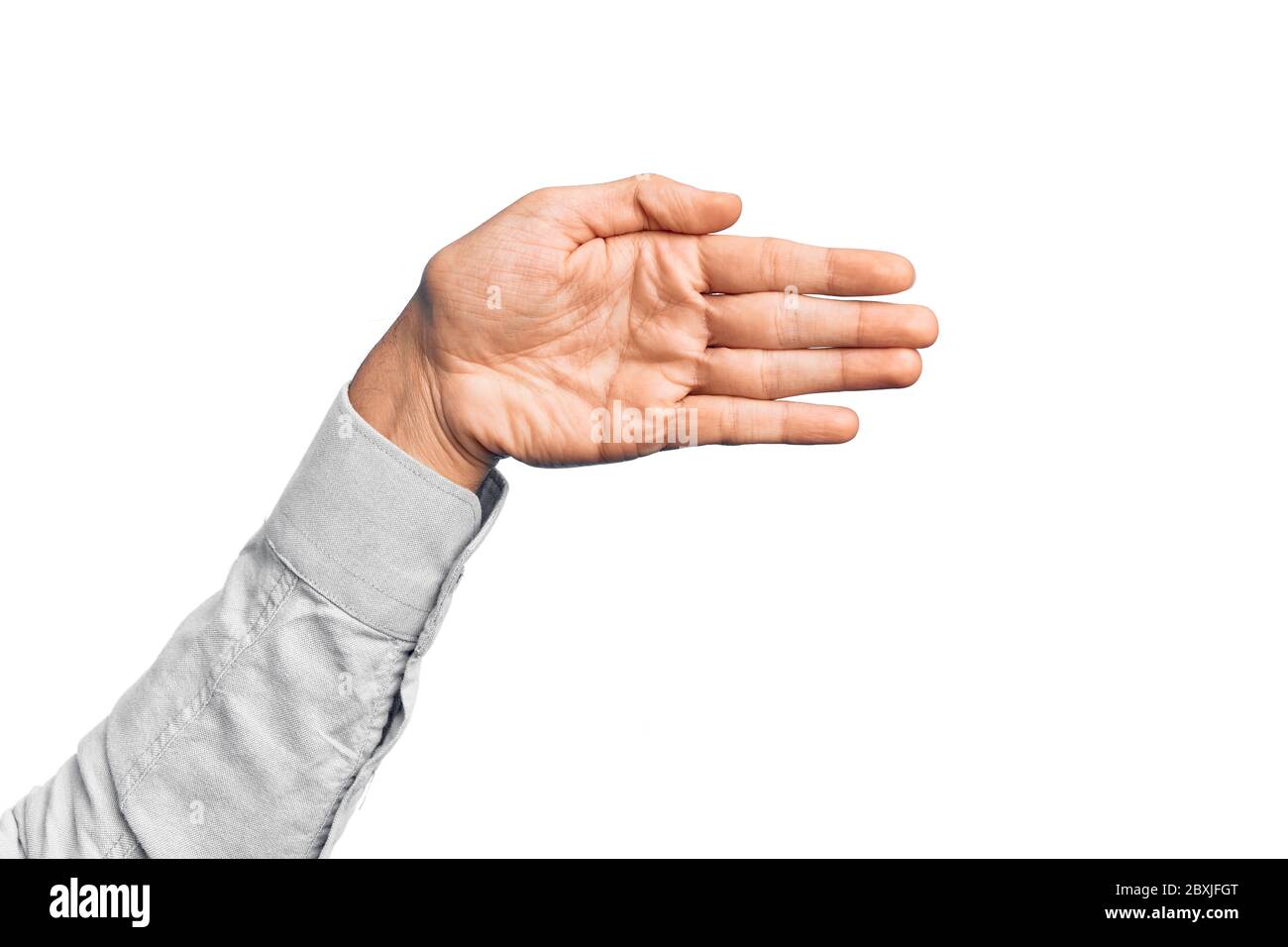 Hand of caucasian young man showing fingers over isolated white ...