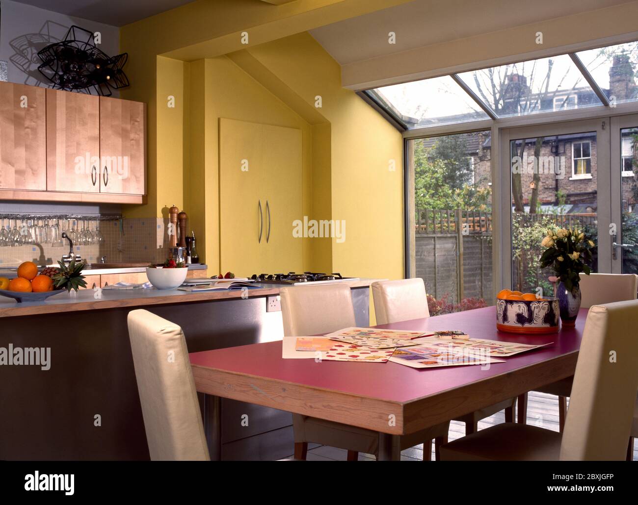 Modern kitchen with conservatory Stock Photo - Alamy
