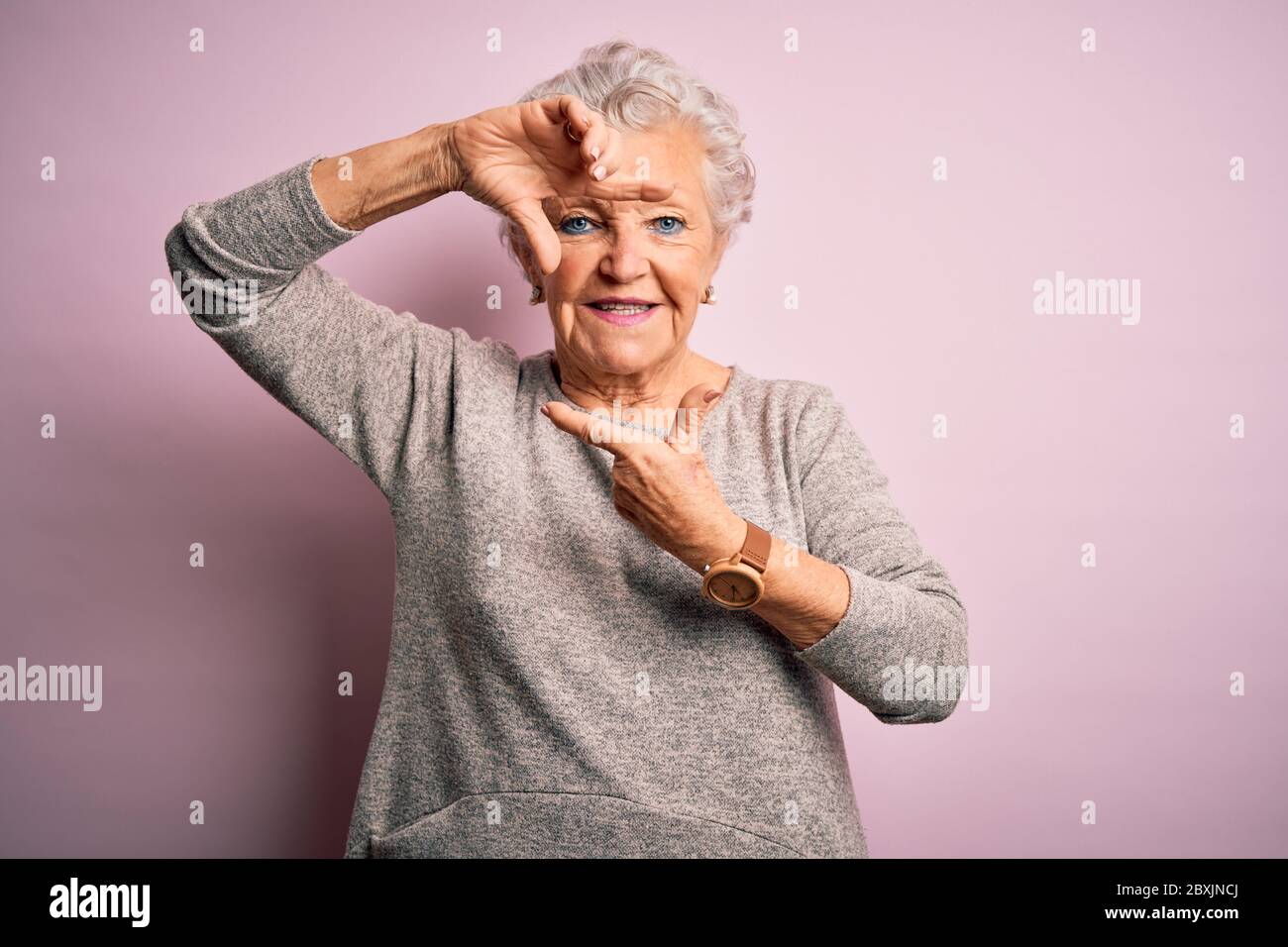 Senior beautiful woman wearing casual t-shirt standing over isolated ...