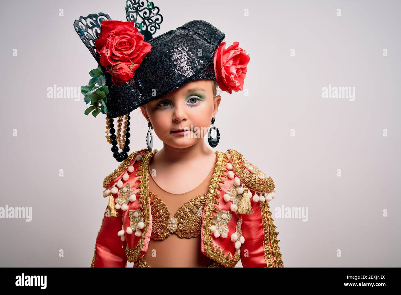 Young little caucasian kid girl wearing bullfighter traditional folkore ...