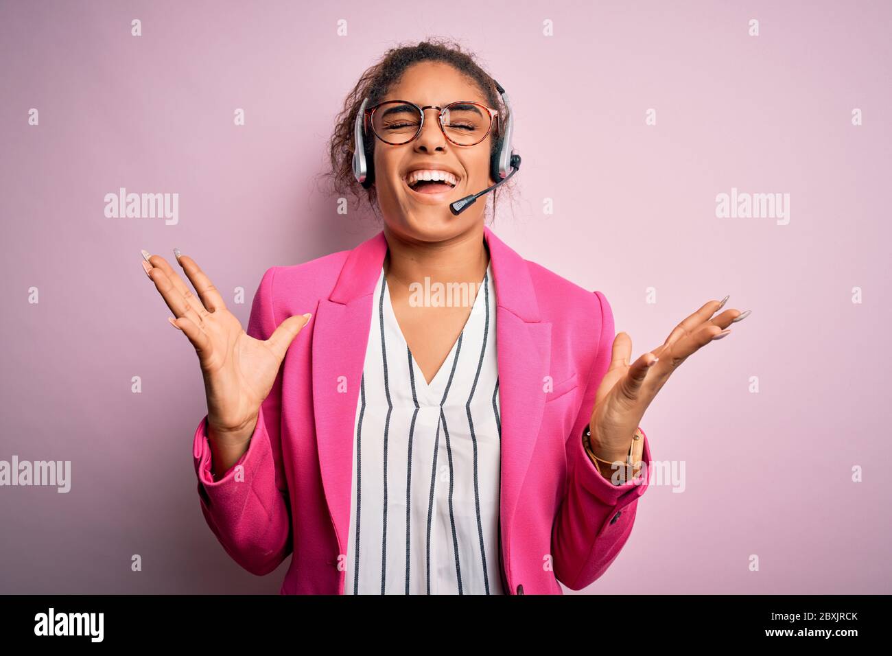 Young african american call center agent girl wearing glasses working ...