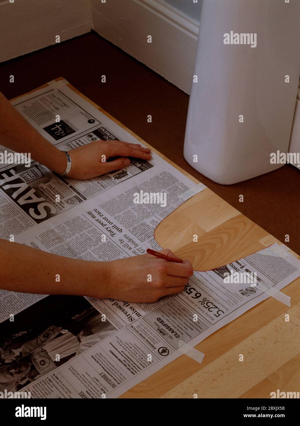 Making a template to cut round corner Stock Photo - Alamy