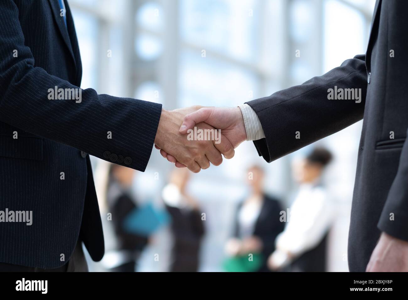 close up. business handshake on office background Stock Photo - Alamy