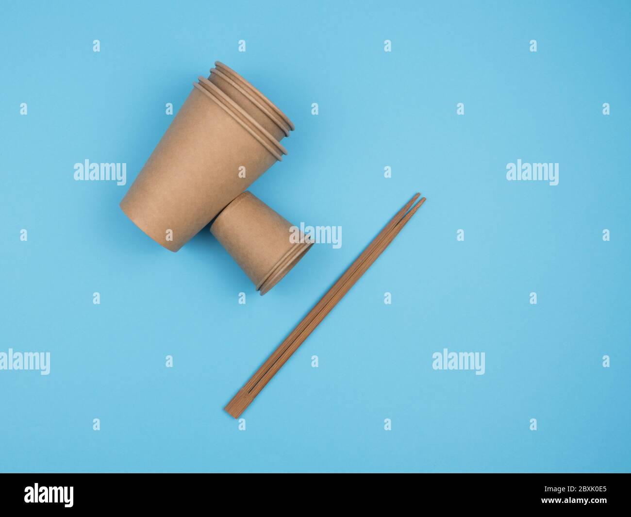 Environmental utensils for fast food restaurants on a blue background ...