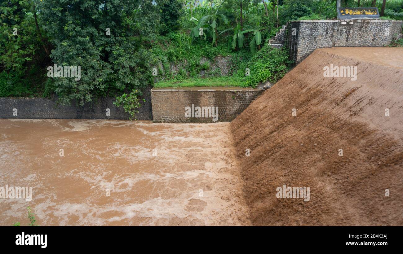 Flash floods in a DAM, visible water becomes turbid because it carries ...