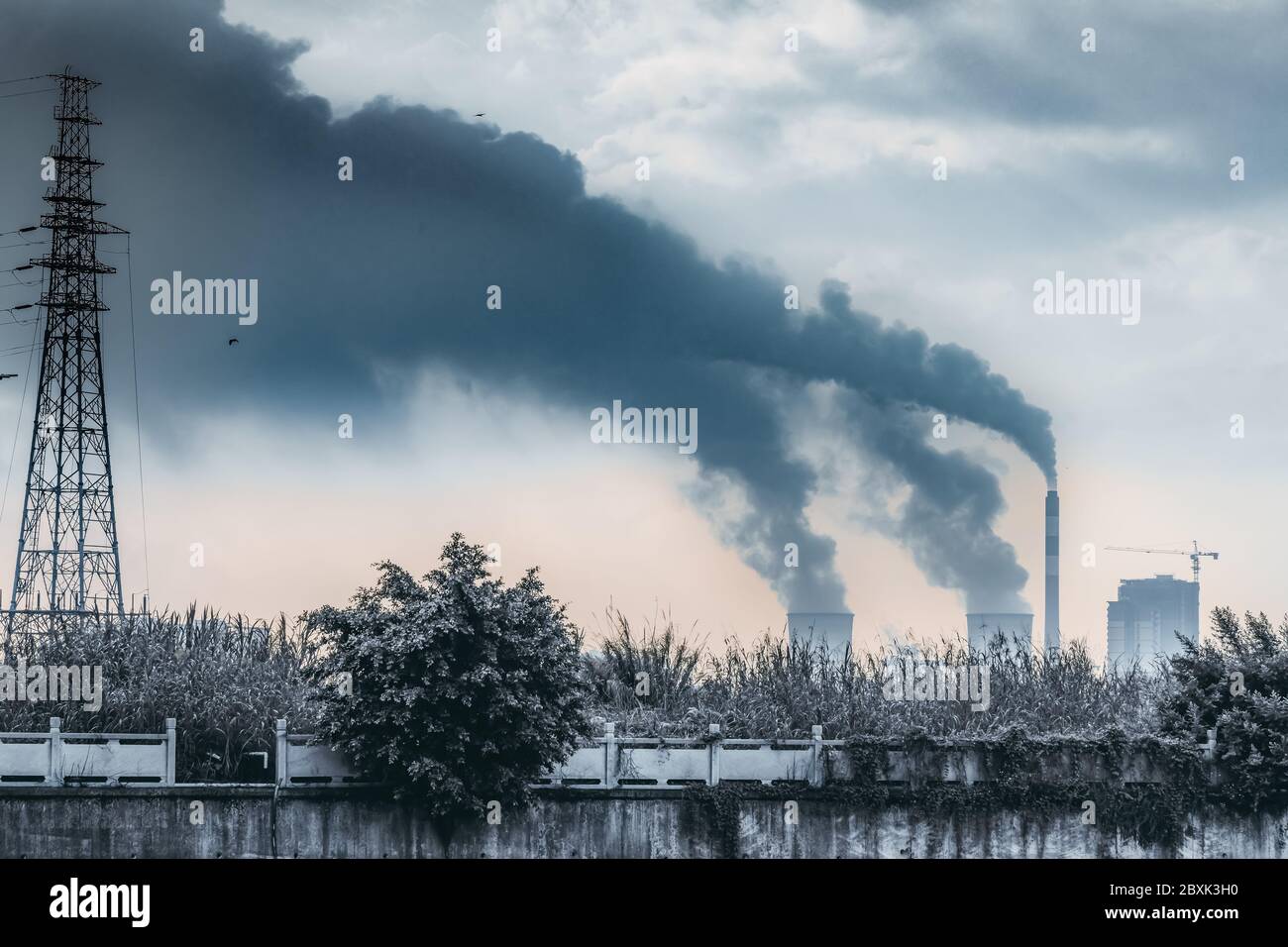 factory funnels with thick and black smoke Stock Photo - Alamy