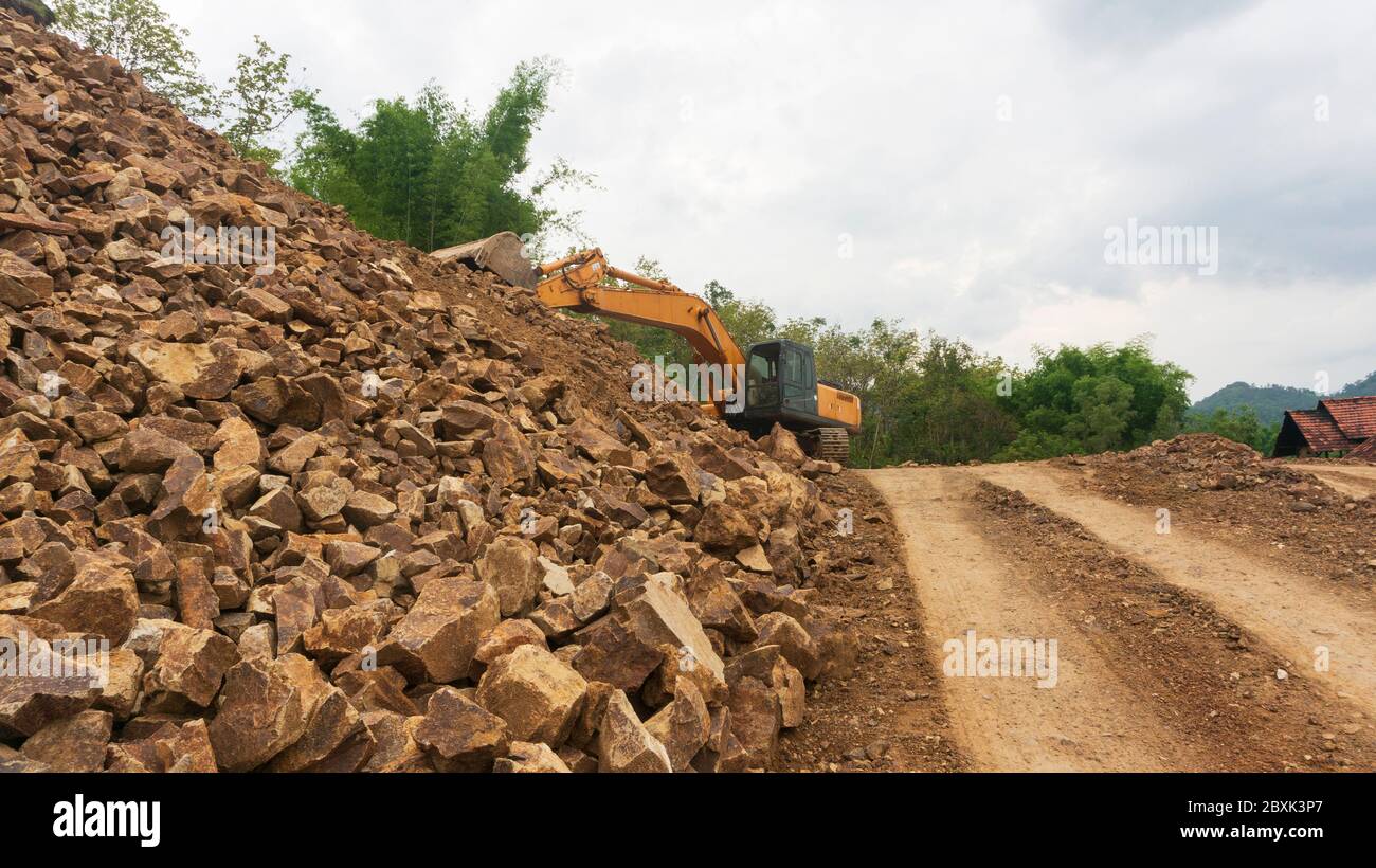 Excavators at the mine site. The process of dredging mining materials ...