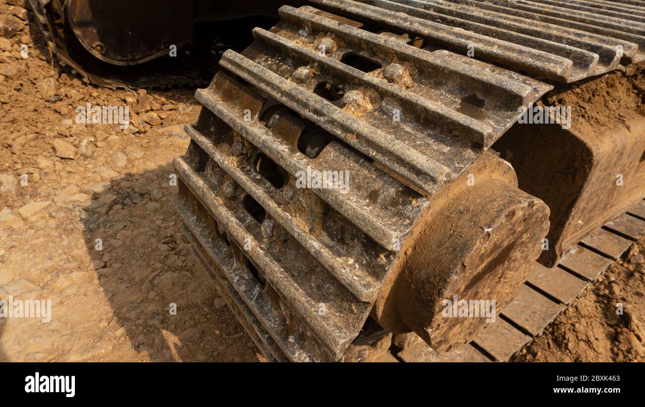 Excavator wheels with ground attached. The maintenance process is ...