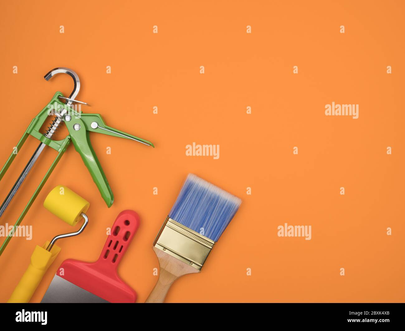 Color painting tool on a green background. The view from the top Stock ...