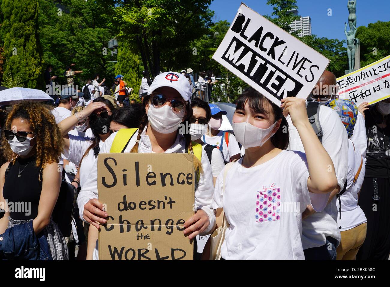 Protesters holding BLM placards during the demonstration.More than a ...