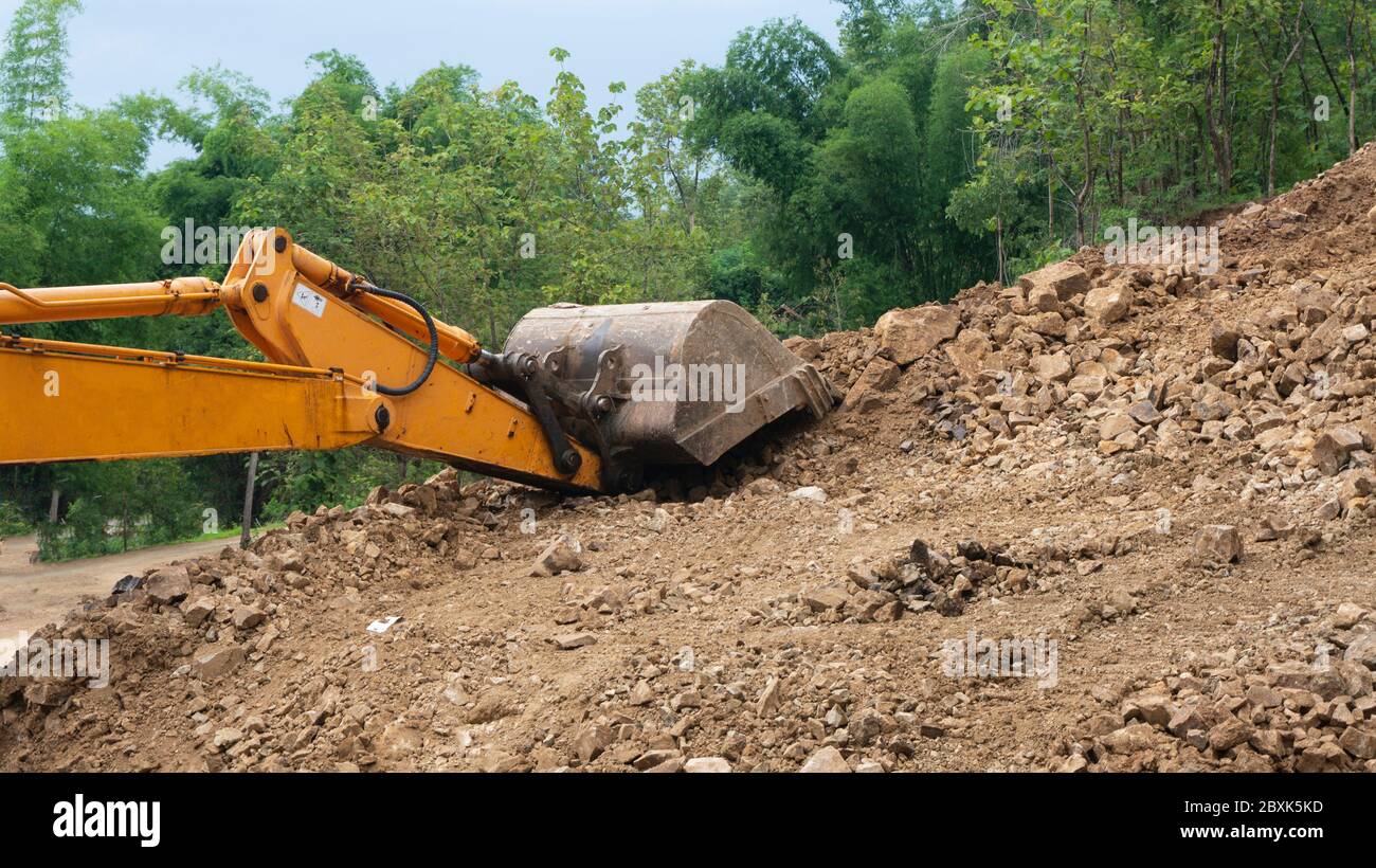 Excavators at the mine site. The process of dredging mining materials ...