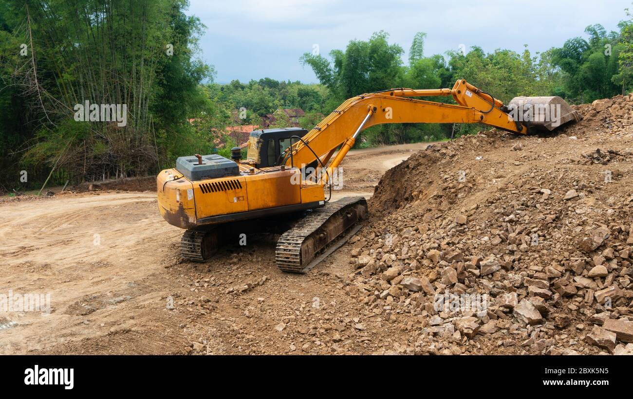 Excavators at the mine site. The process of dredging mining materials ...