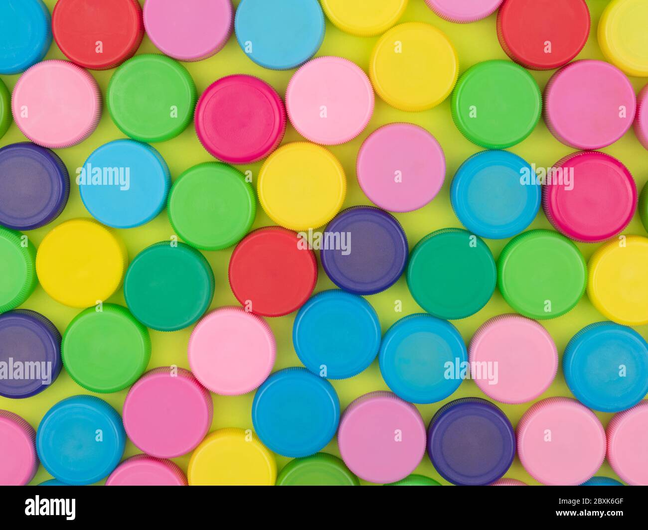 Colorful plastic caps for bottles Stock Photo - Alamy