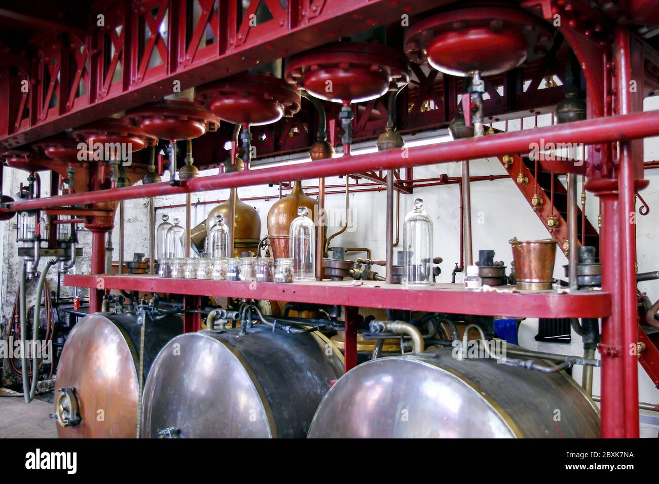 Old distillery cuves and tubing Stock Photo - Alamy
