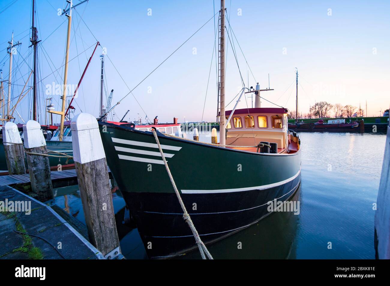 Fishing boat closeup in harbour Stock Photo - Alamy