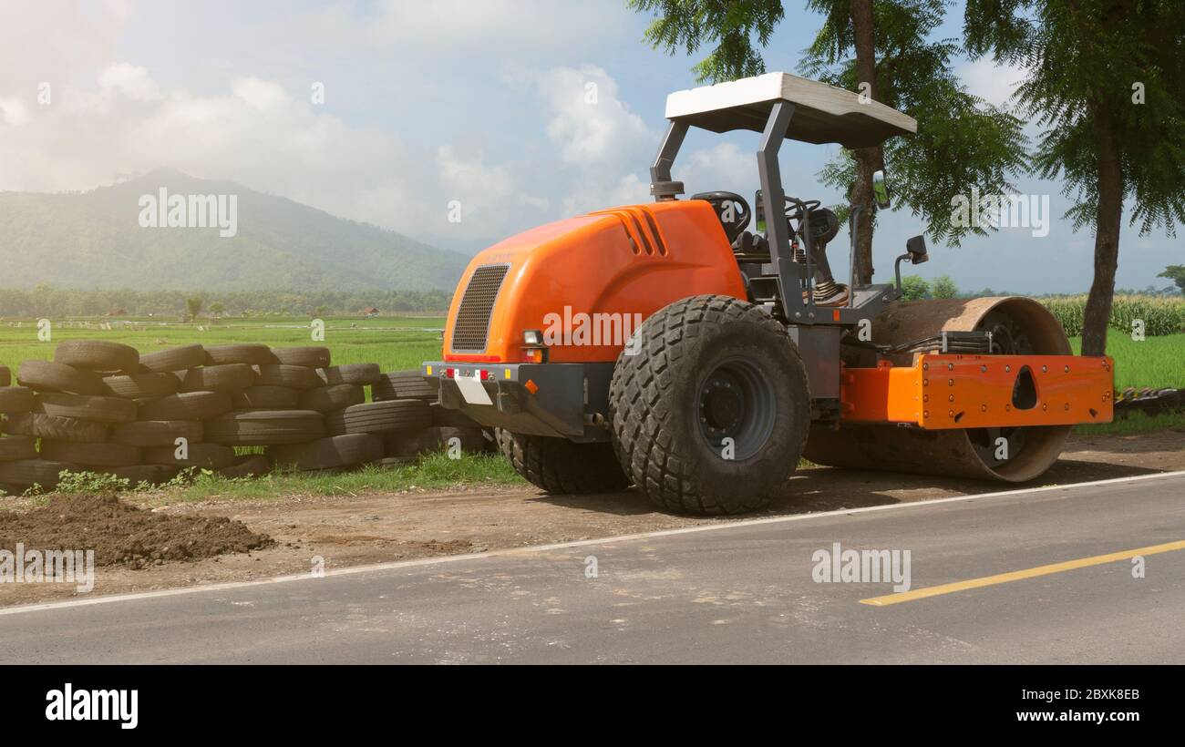 Vibration single-cylinder road roller leveling the ground for the ...