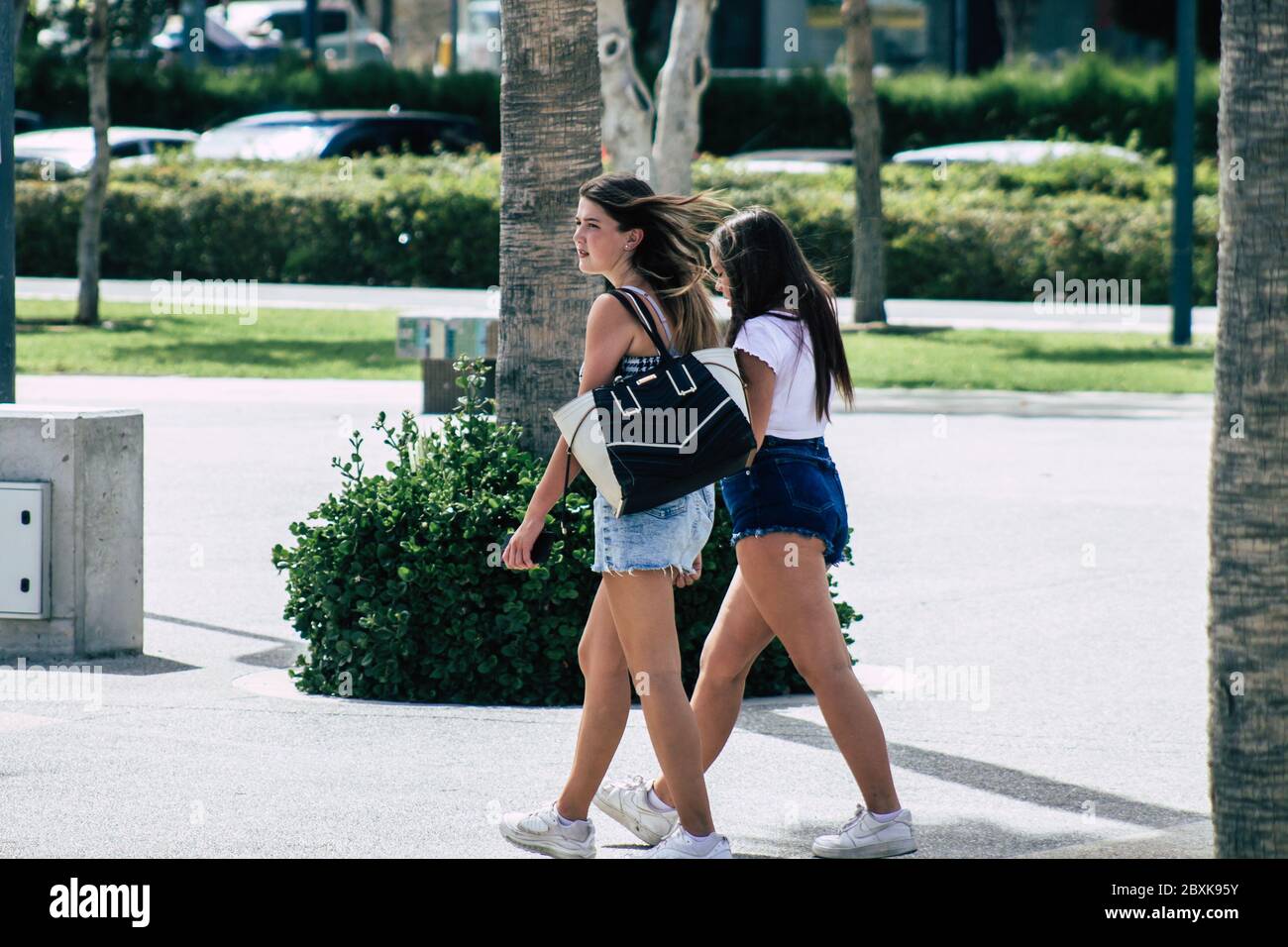 Limassol Cyprus June 07, 2020 View of unidentified girls walking on the ...