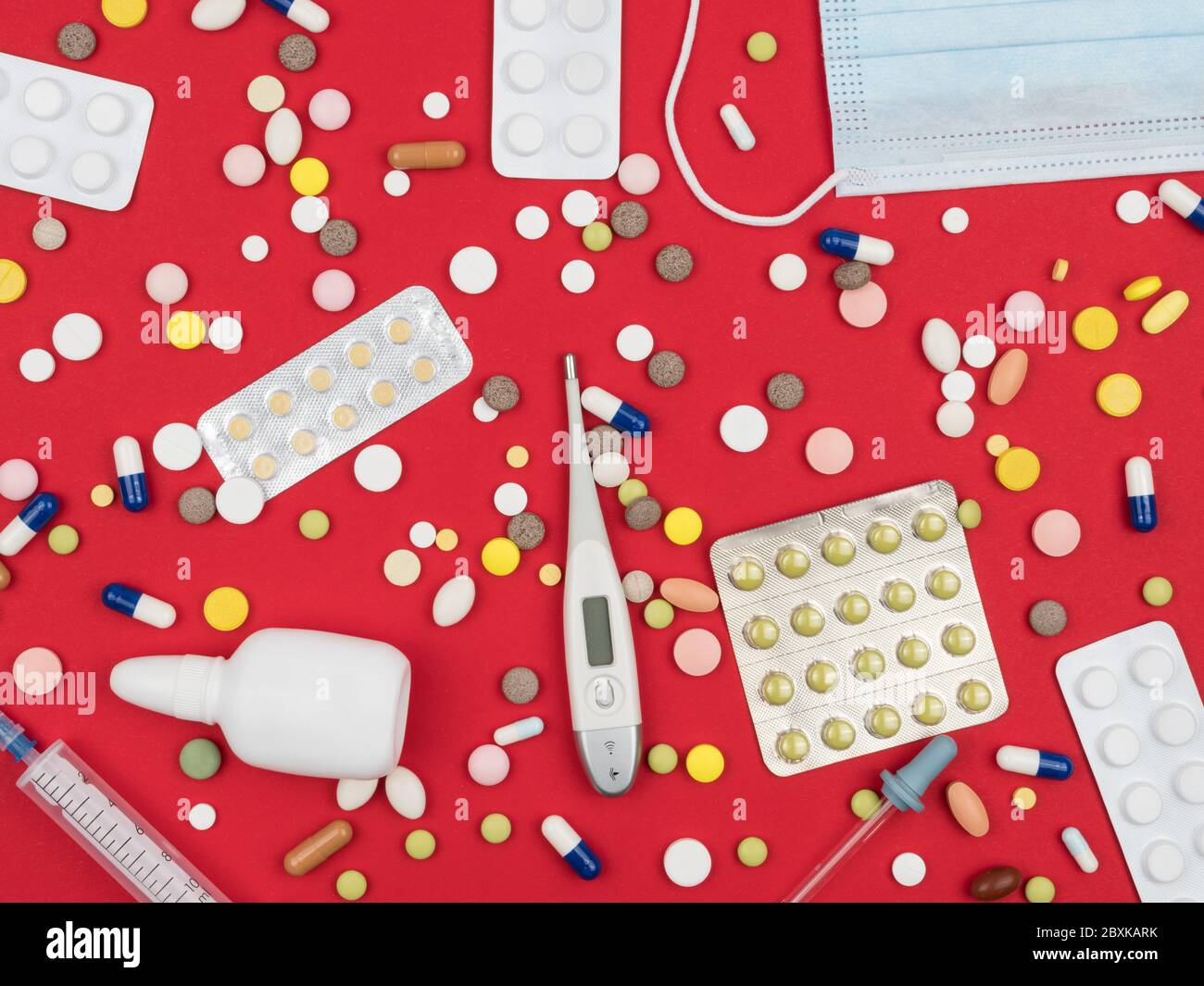 Medical range on a red background Stock Photo - Alamy