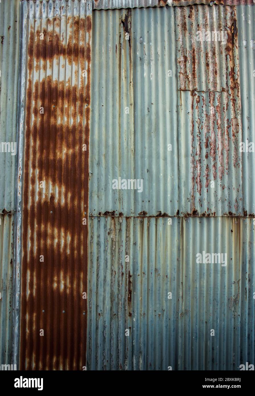 Rusting weathered corrugated iron wall ideal as background Stock Photo ...
