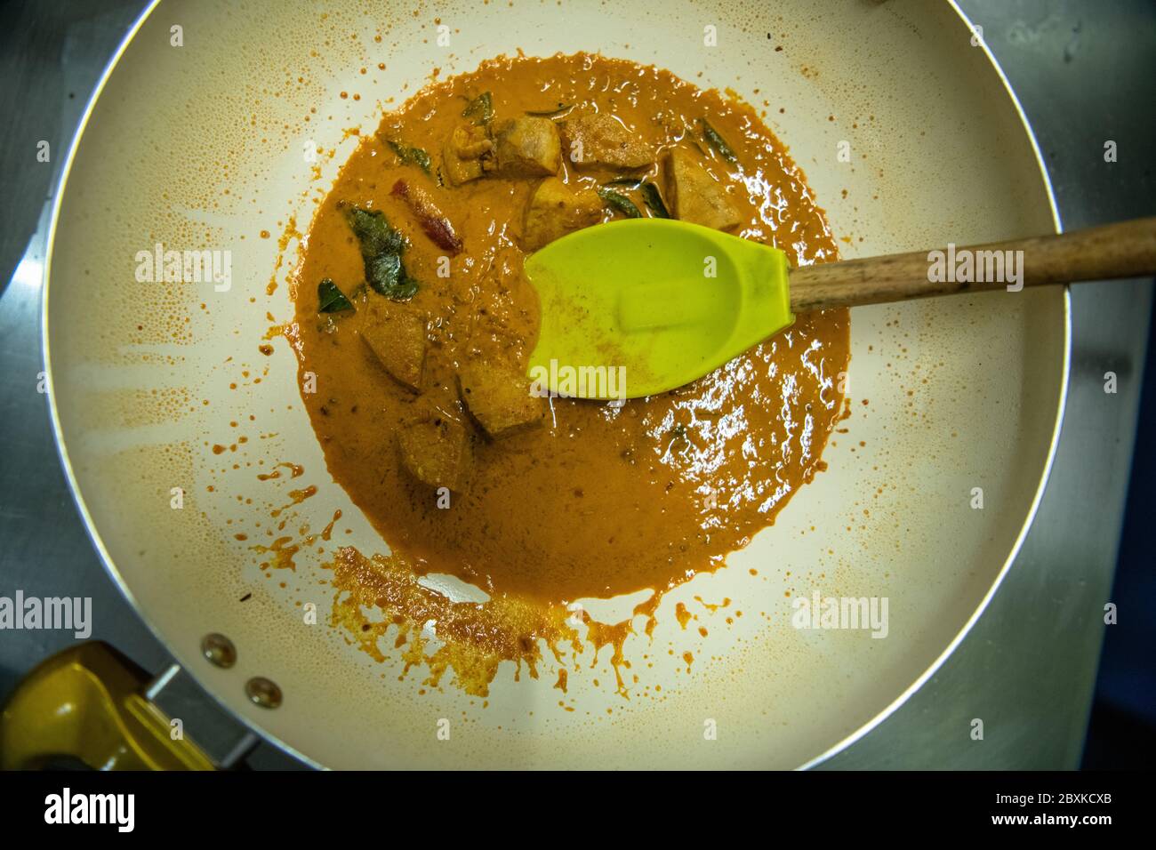 Cooking South Indian food curry Stock Photo - Alamy
