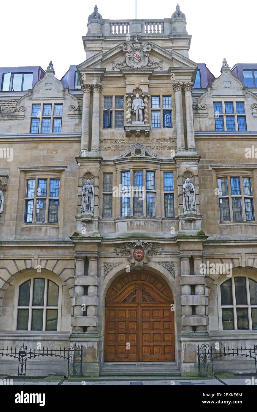 statue of Cecil Rhodes above an entrance to Oriel College Oxford and including his coat of arms ...
