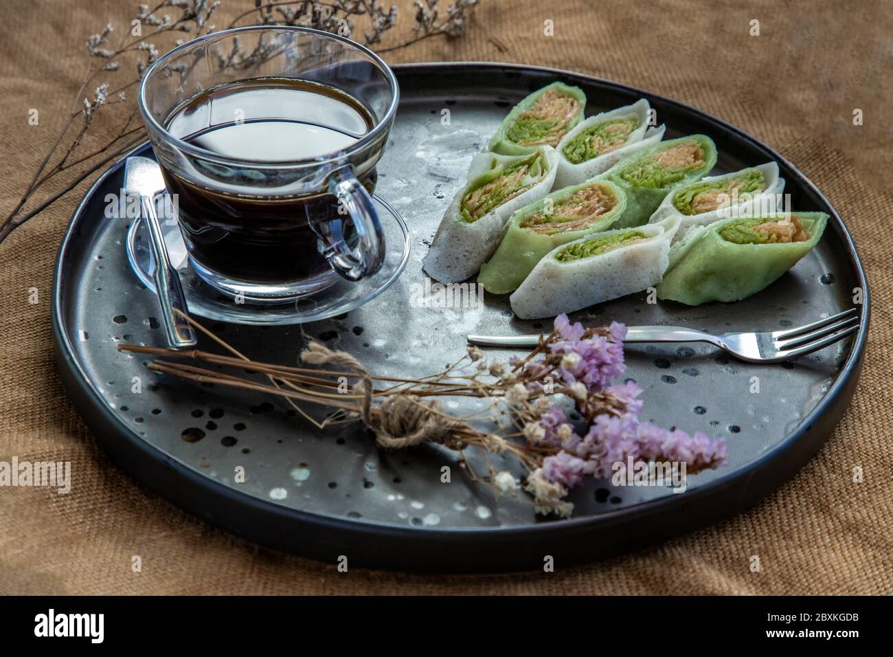 Afternoon tea set. Roti Sai Mai is name of Thai cotton candy wrapped ...