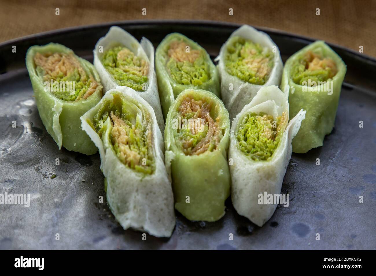 Roti Sai Mai is name of Thai cotton candy wrapped with pastry dough cut ...