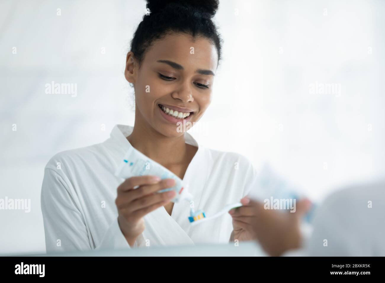 Black person toothpaste hi-res stock photography and images - Alamy