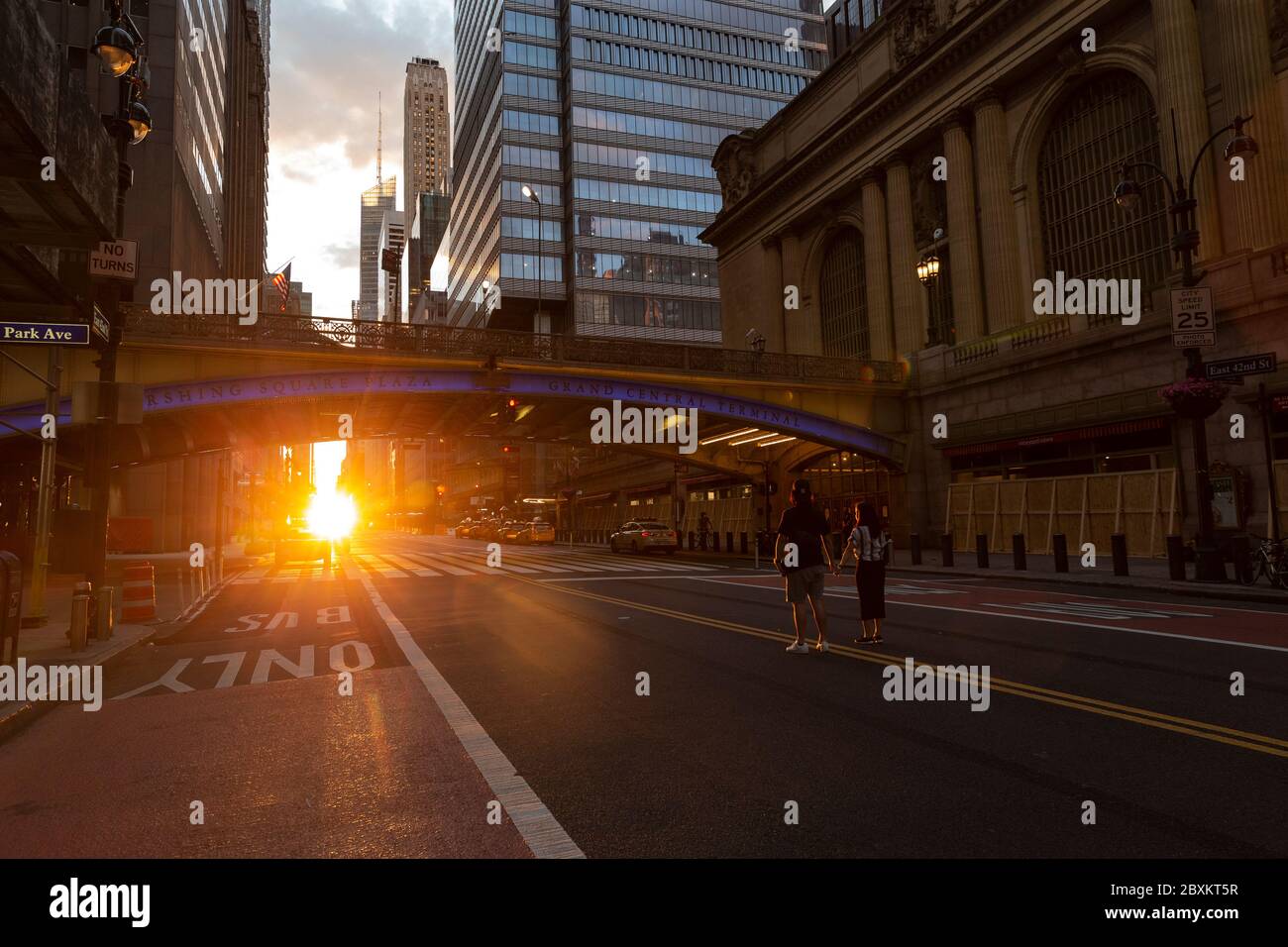New York, NY - June 7, 2020: Manhattanhenge sunset along 42nd street as ...
