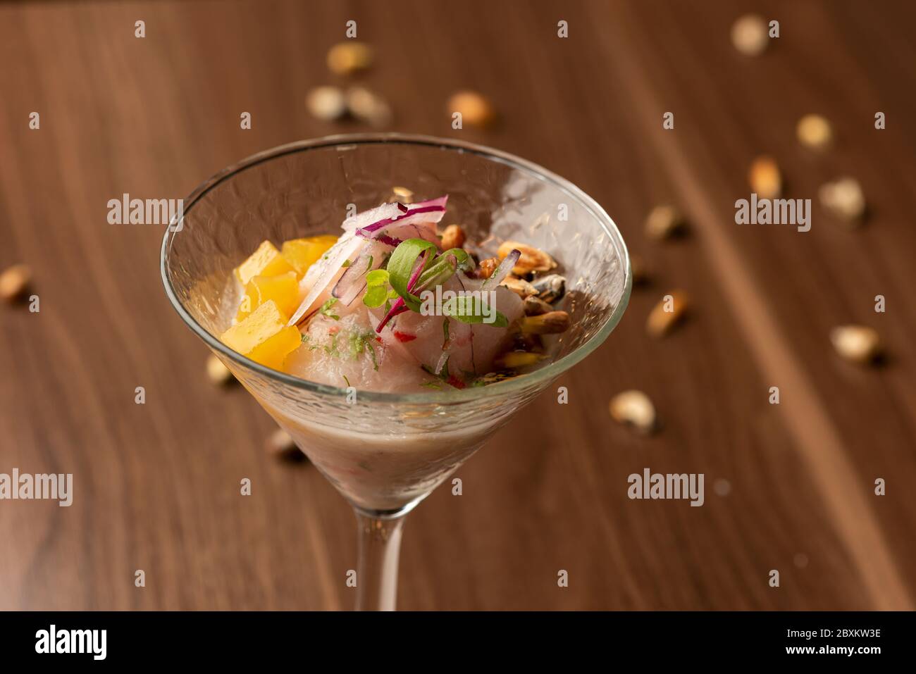 ceviche on a cocktail glass appetizer peruvian fine dinner - fish with ...