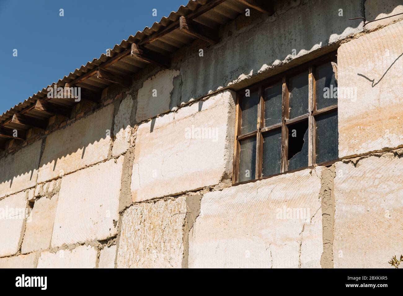Broken window in an old building because of an abandoned one Stock ...