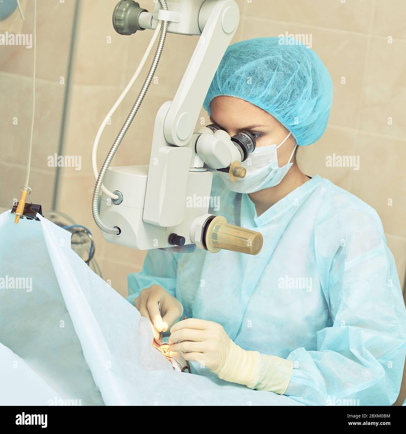 Ophthalmology laser microscope operation. Doctor in clinic. Patient eye ...