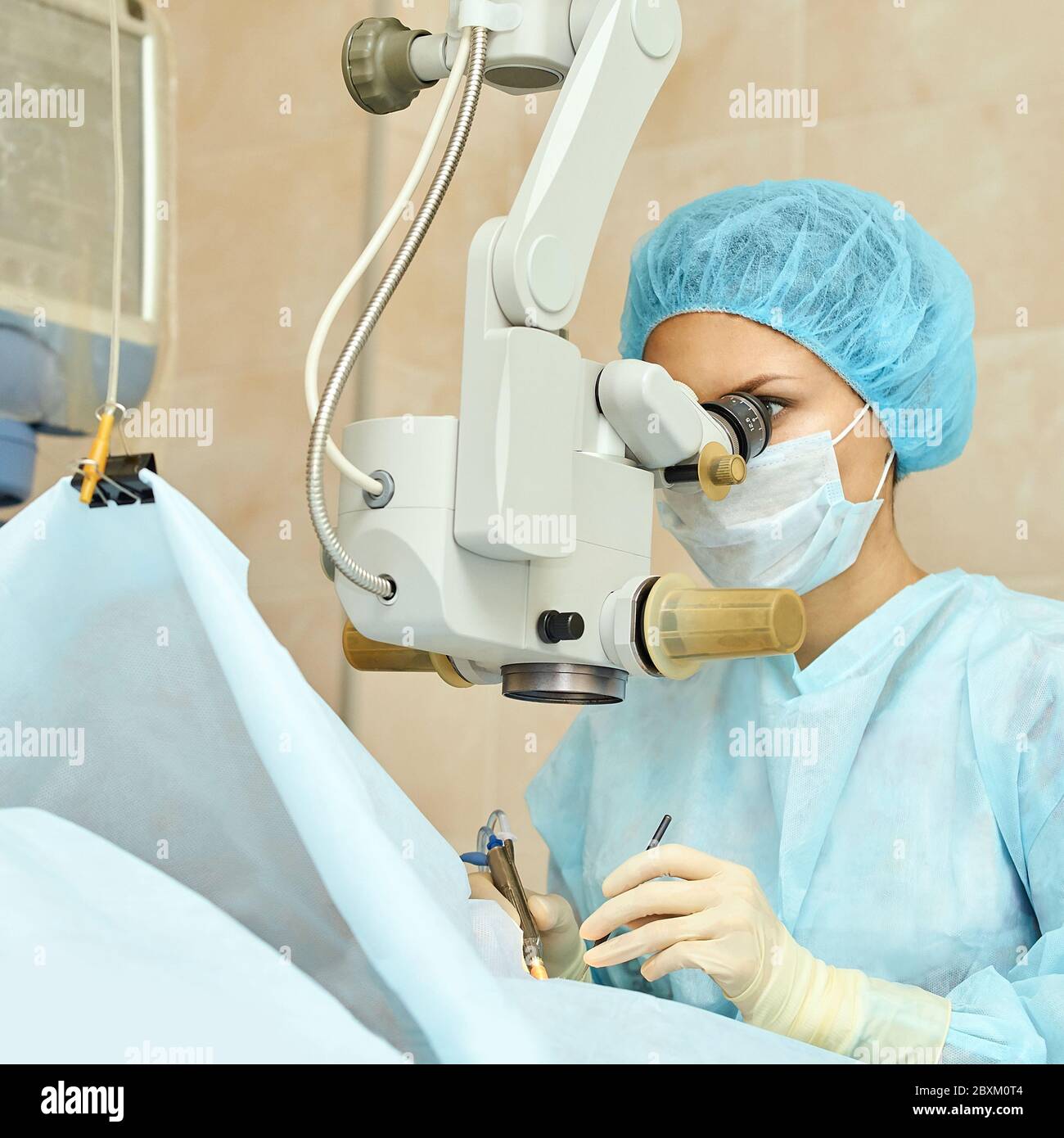 Ophthalmology laser microscope operation. Doctor in clinic. Patient eye ...