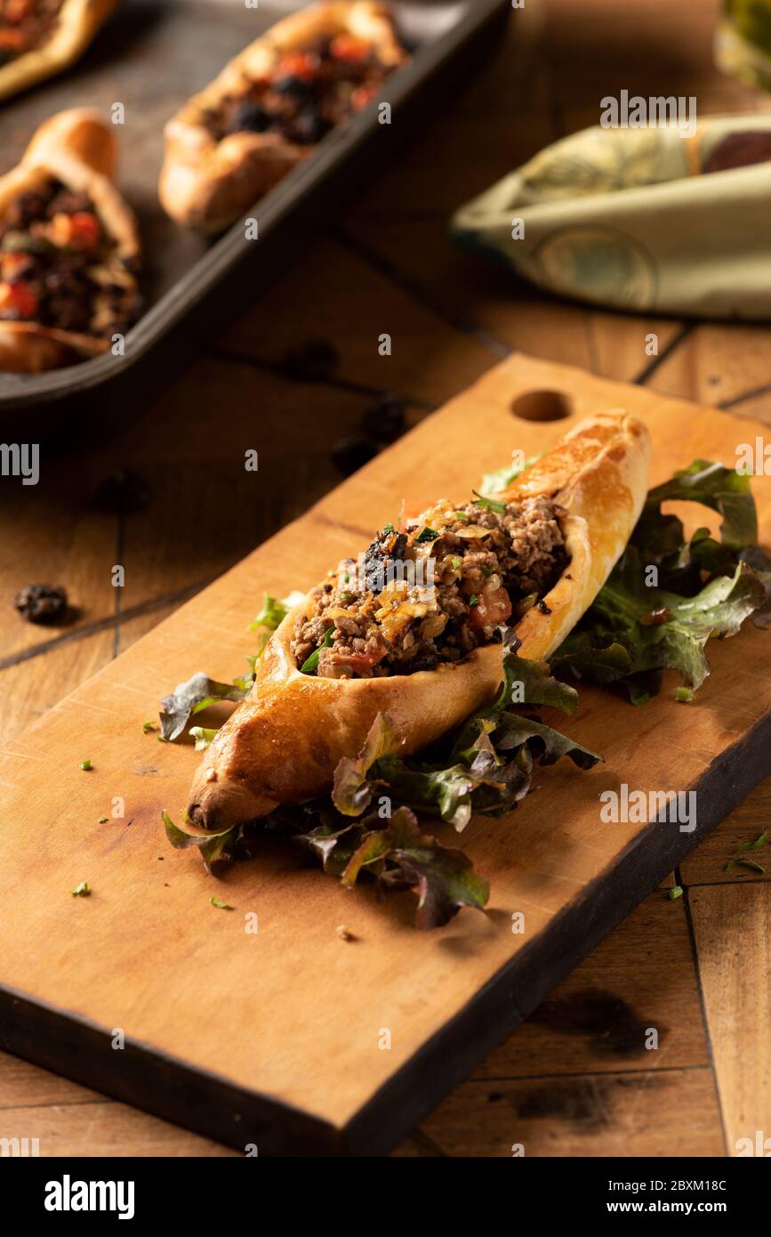 sfiha arabian traditional food baked and stuffed with ground meat with ...