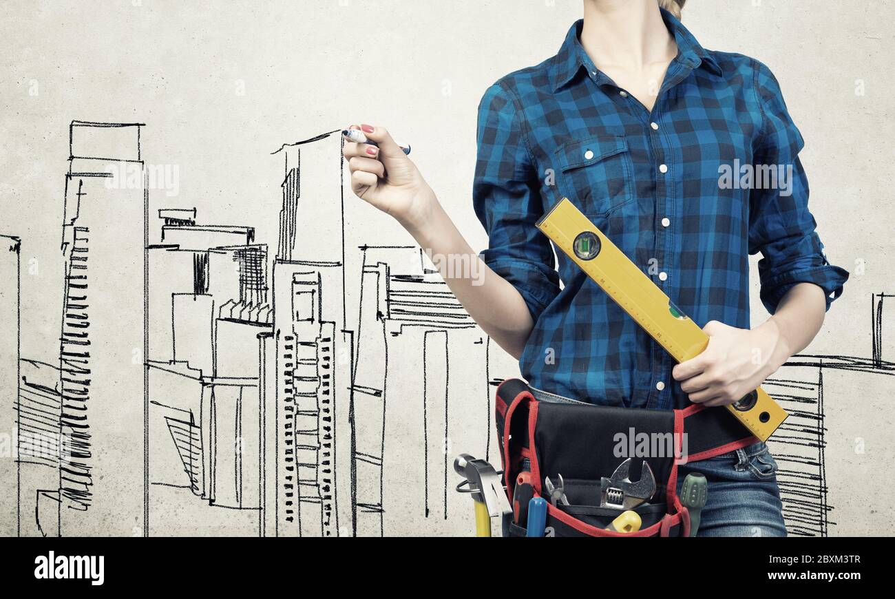Woman engineer sketching her ideas Stock Photo - Alamy
