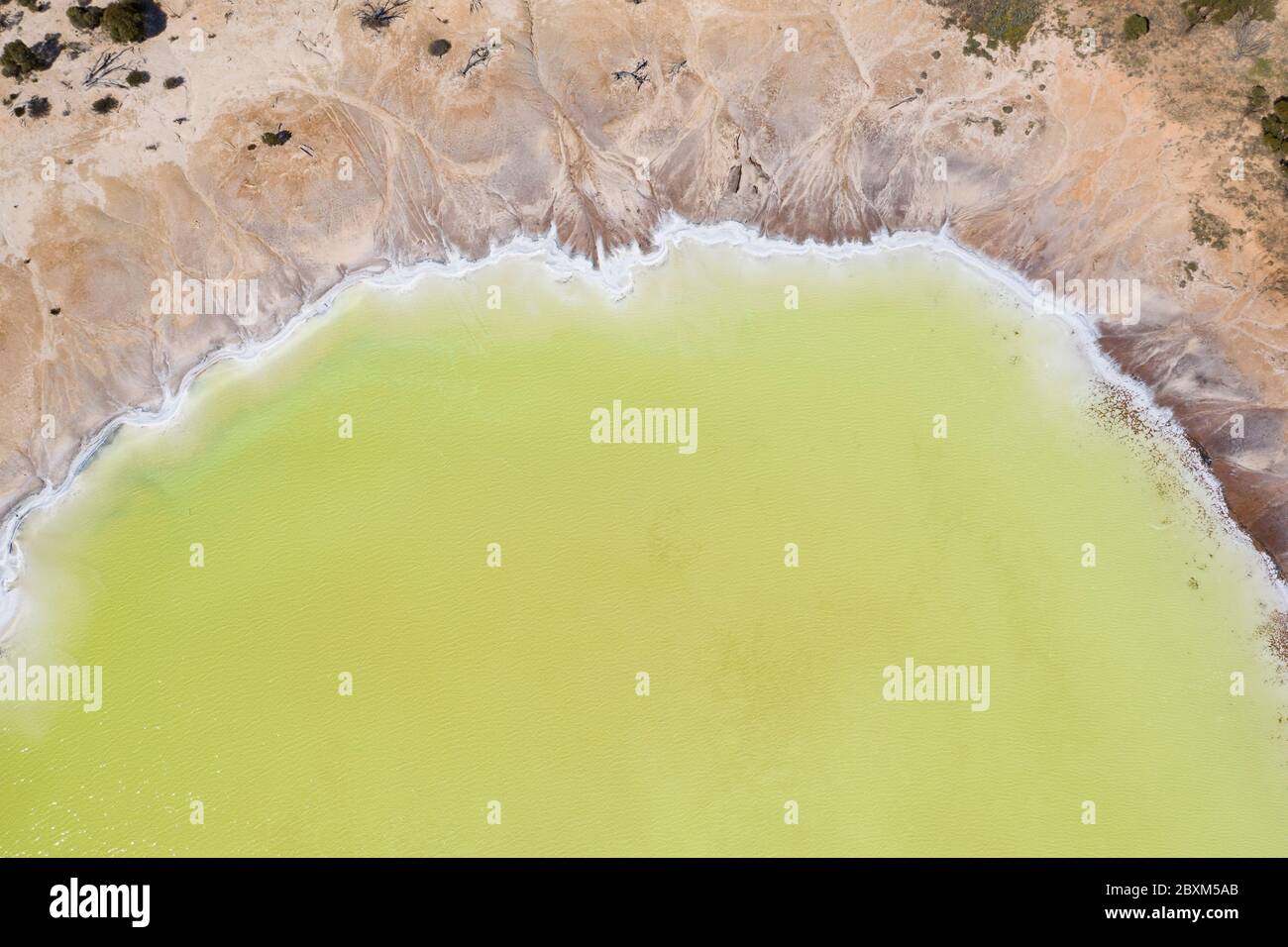 Aerial view of the beautiful yellow salt lake known as Statues lake ...