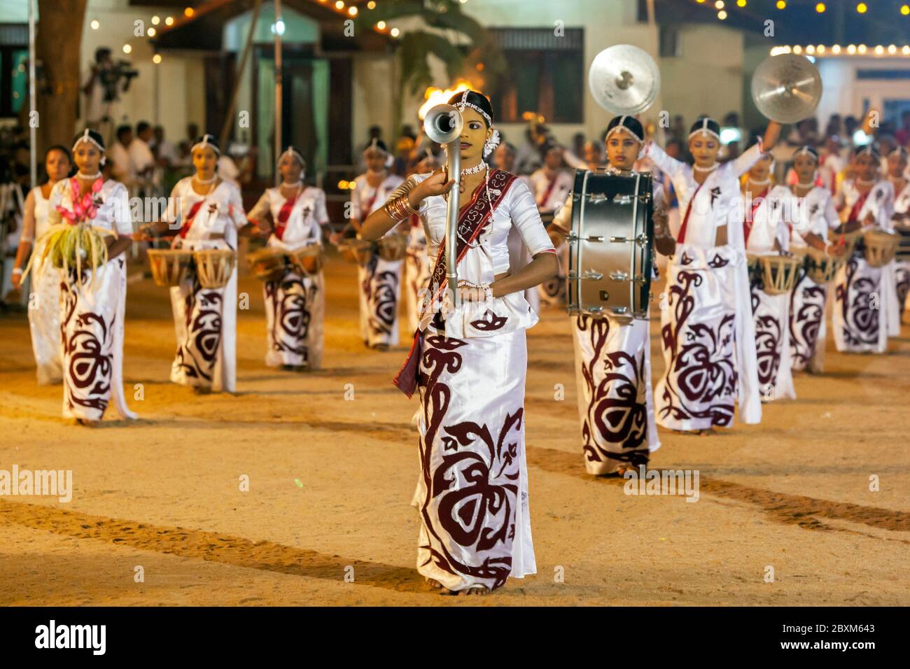 A band of female musicians perform during the Kataragama Festival in ...