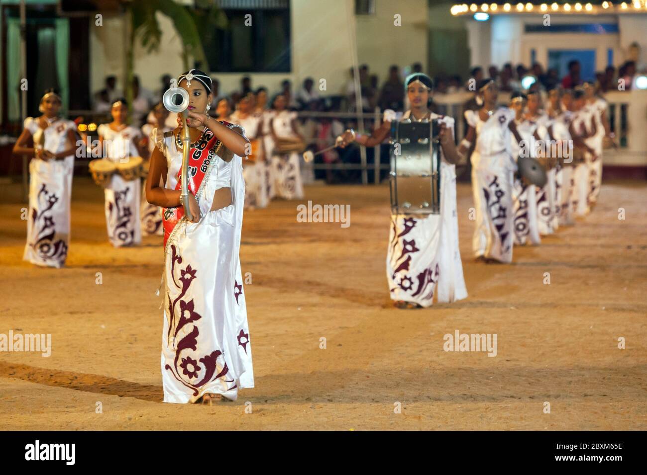 A band of female musicians perform during the Kataragama Festival in ...