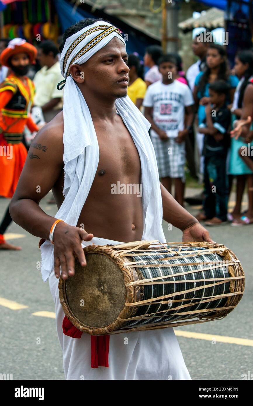A Yak Beraya player performs during the Hikkaduwa Perahera in Sri Lanka ...