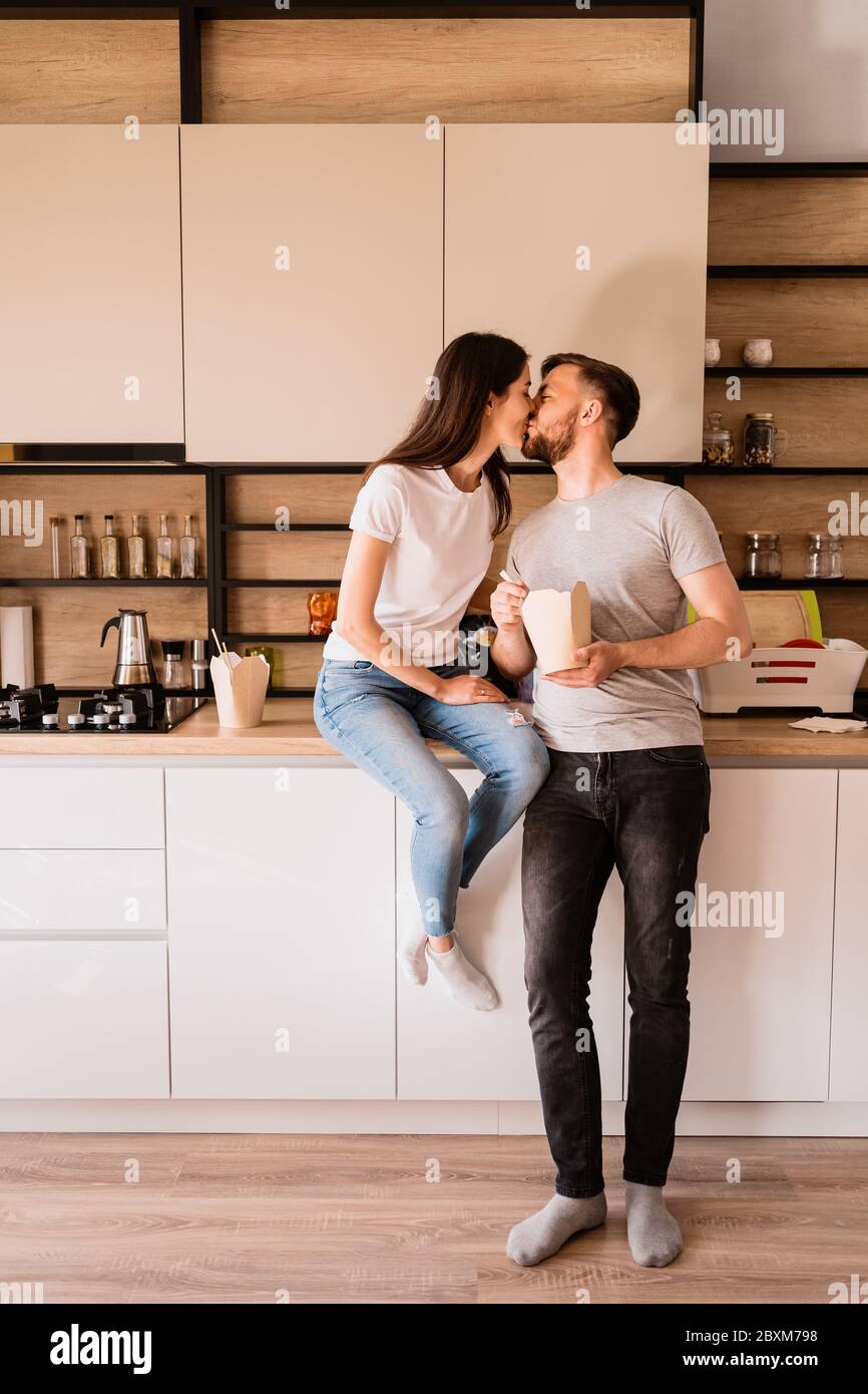 Couple kissing eating chinese food hi-res stock photography and images ...