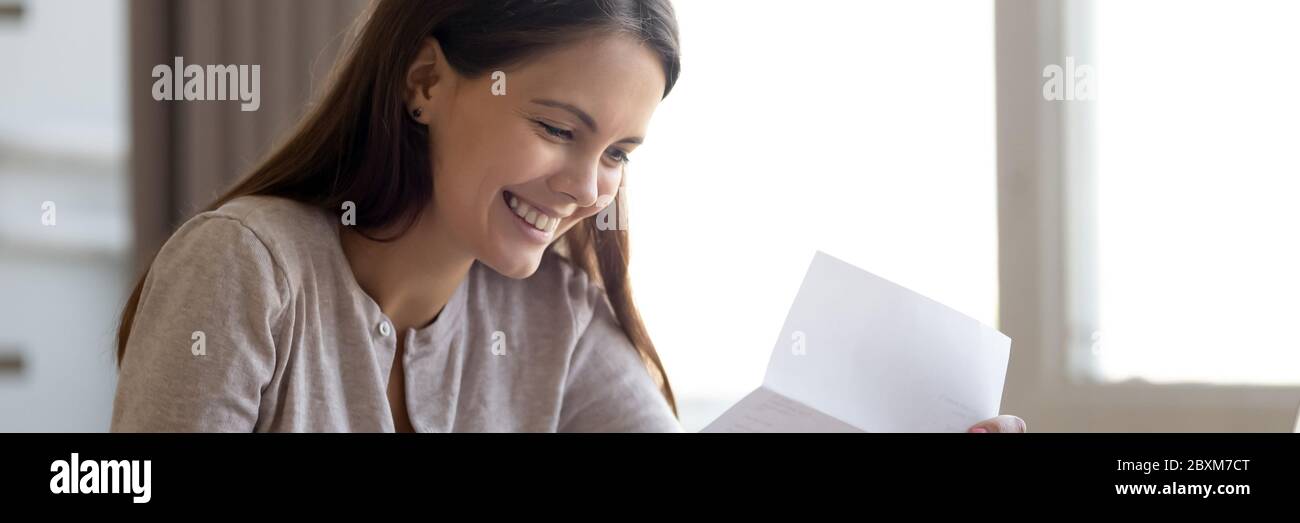Happy student girl reading letter with good news horizontal photo Stock ...
