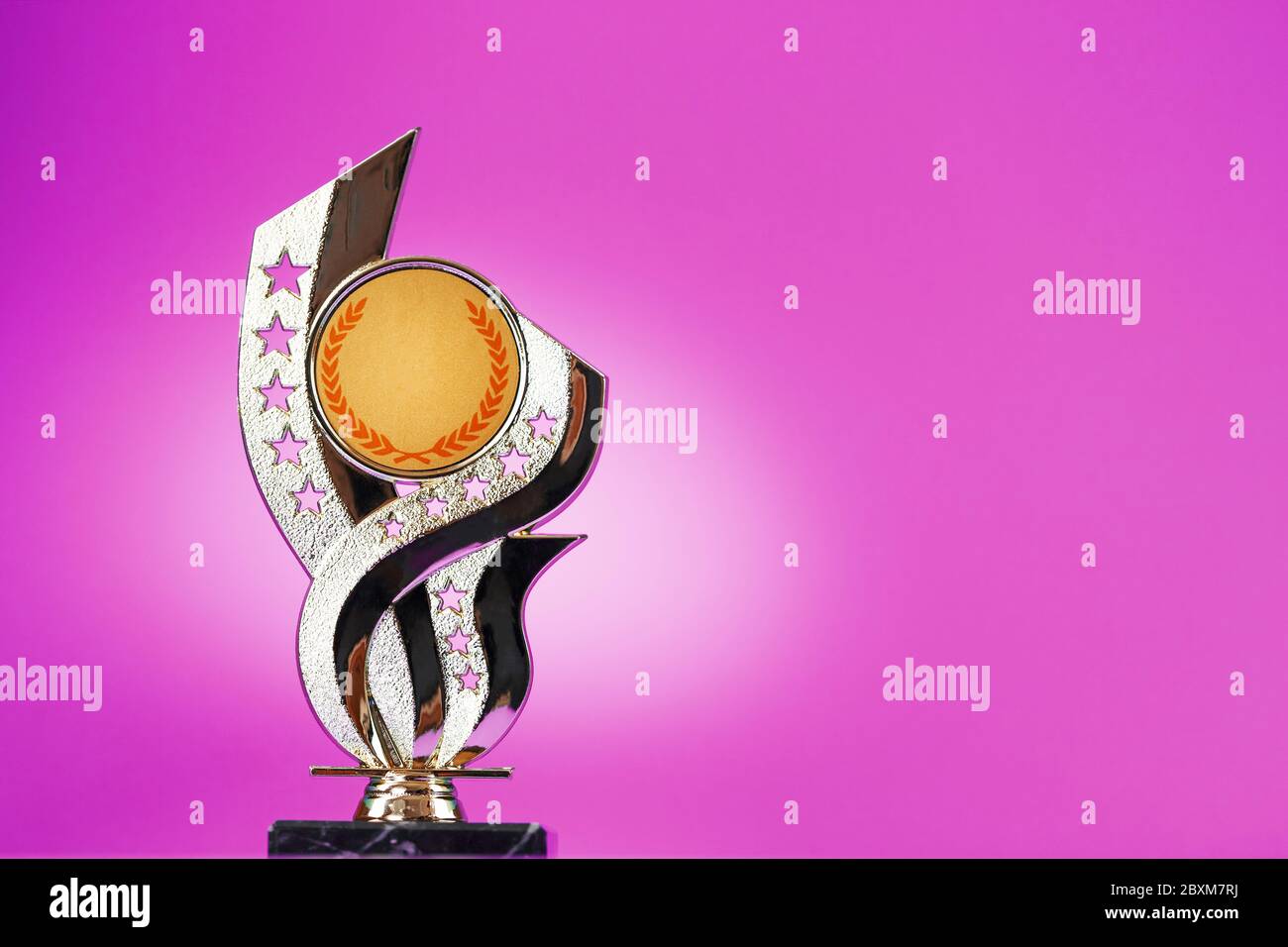 Gold prize on a pink background. Super prize Stock Photo - Alamy