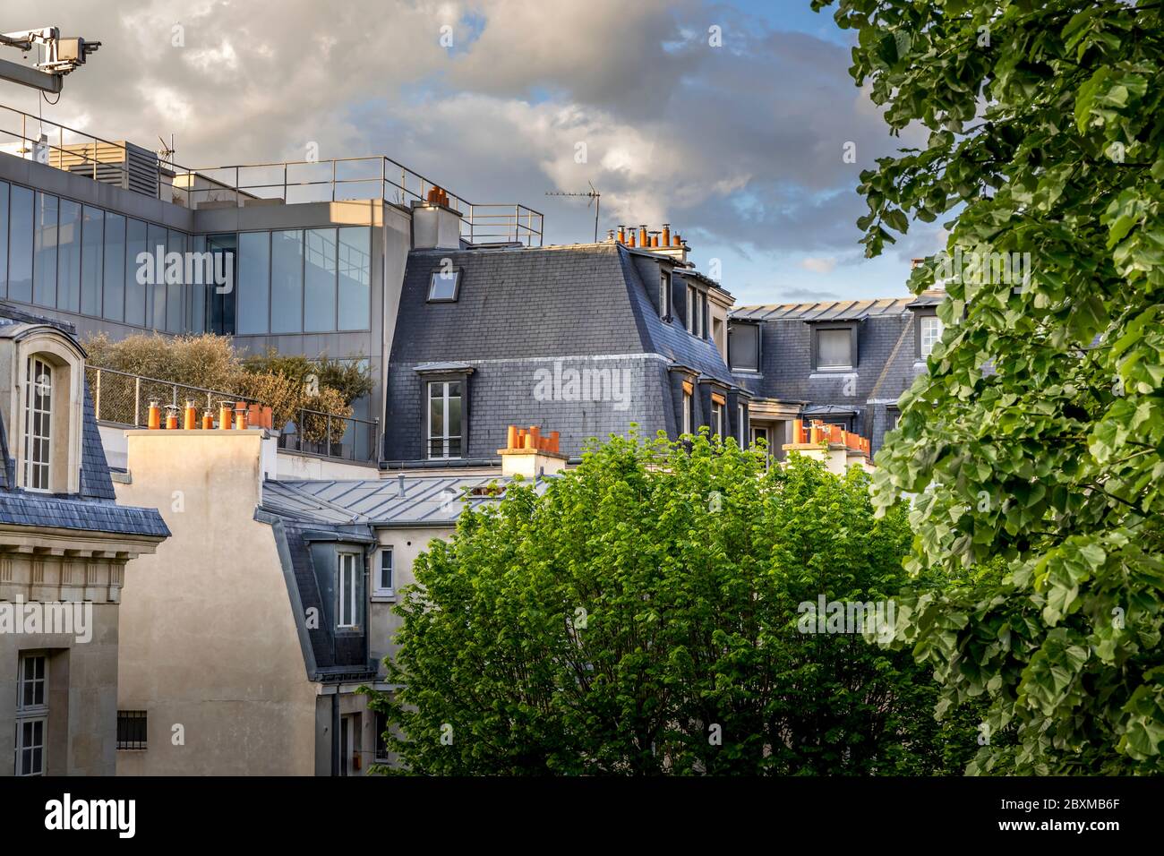 Paris, France - April 17, 2020: Typical roofs of haussmann buildings in ...