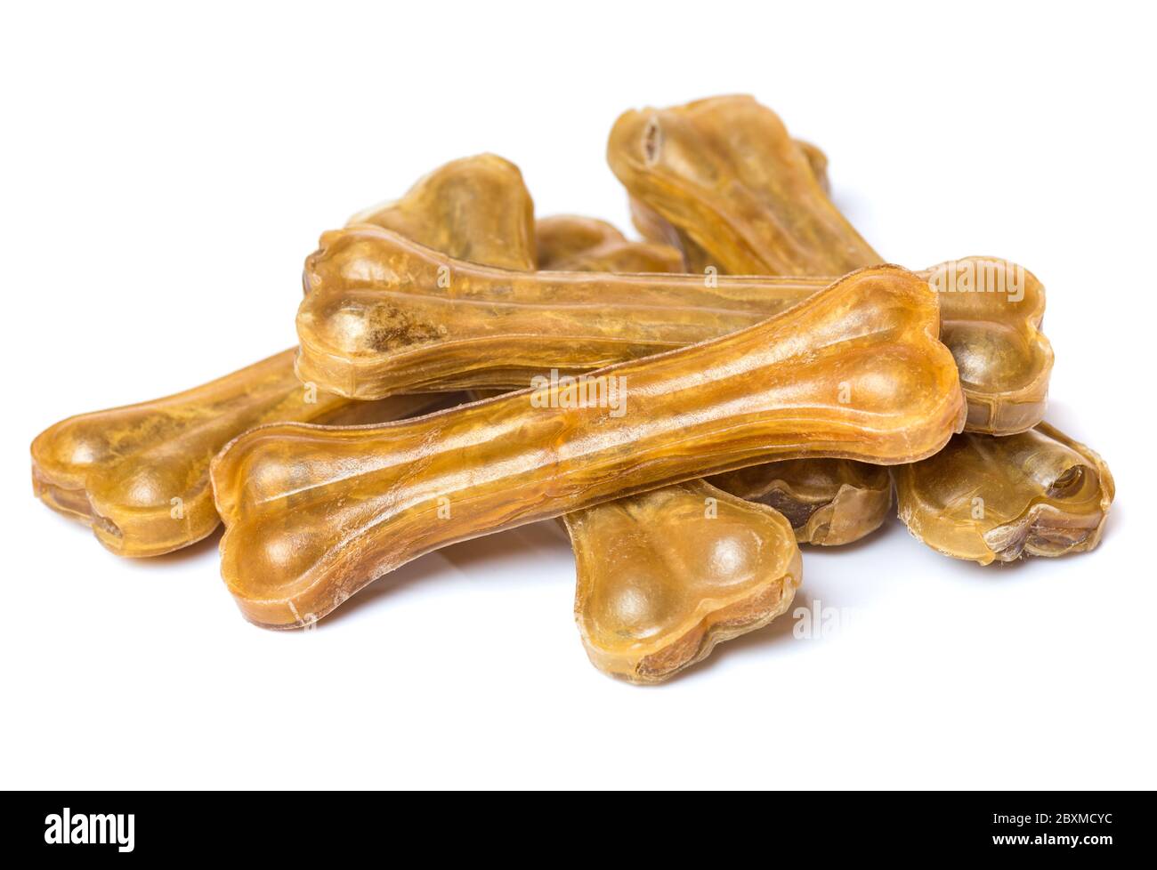 Dog bone food on white Stock Photo - Alamy